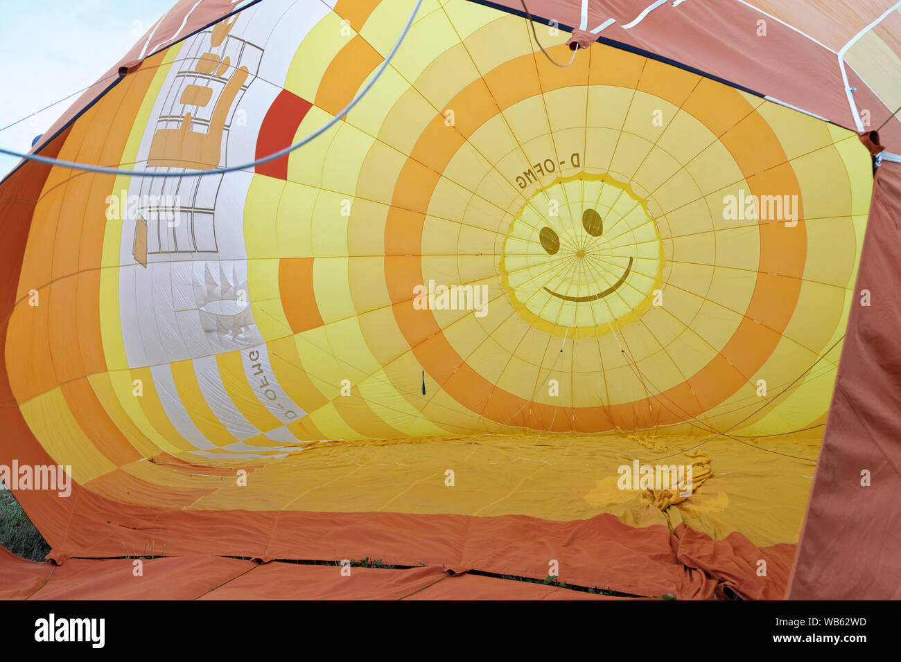 Chambley, France. 2nd August, 2019. Inflating a hot air balloon before ...