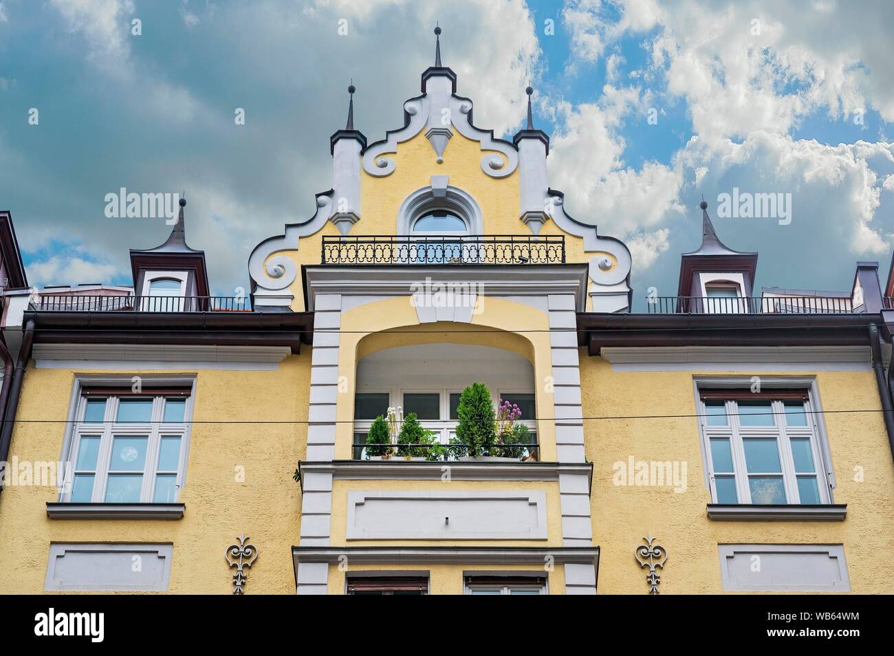 Facade with gable and greened bay window, old building, Munich, Upper ...
