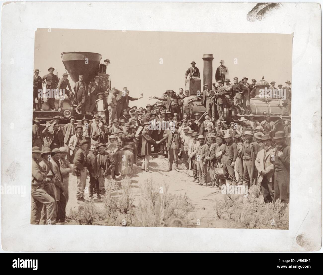 East and West Shaking hands at the laying of last rail Union Pacific ...