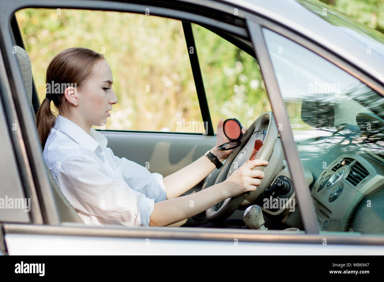 Putting On Makeup While Driving