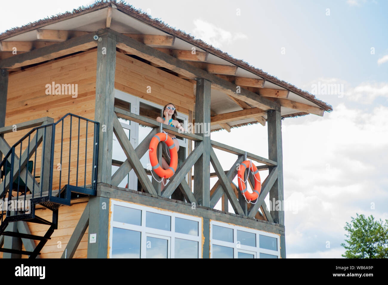 Lifeguard tower for rescue baywatch on beach. Wooden house on sea shore ...