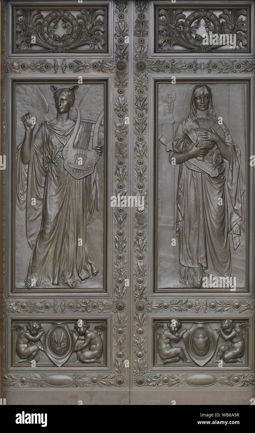 Exterior view. Bronze doors at the main entrance with female figures ...