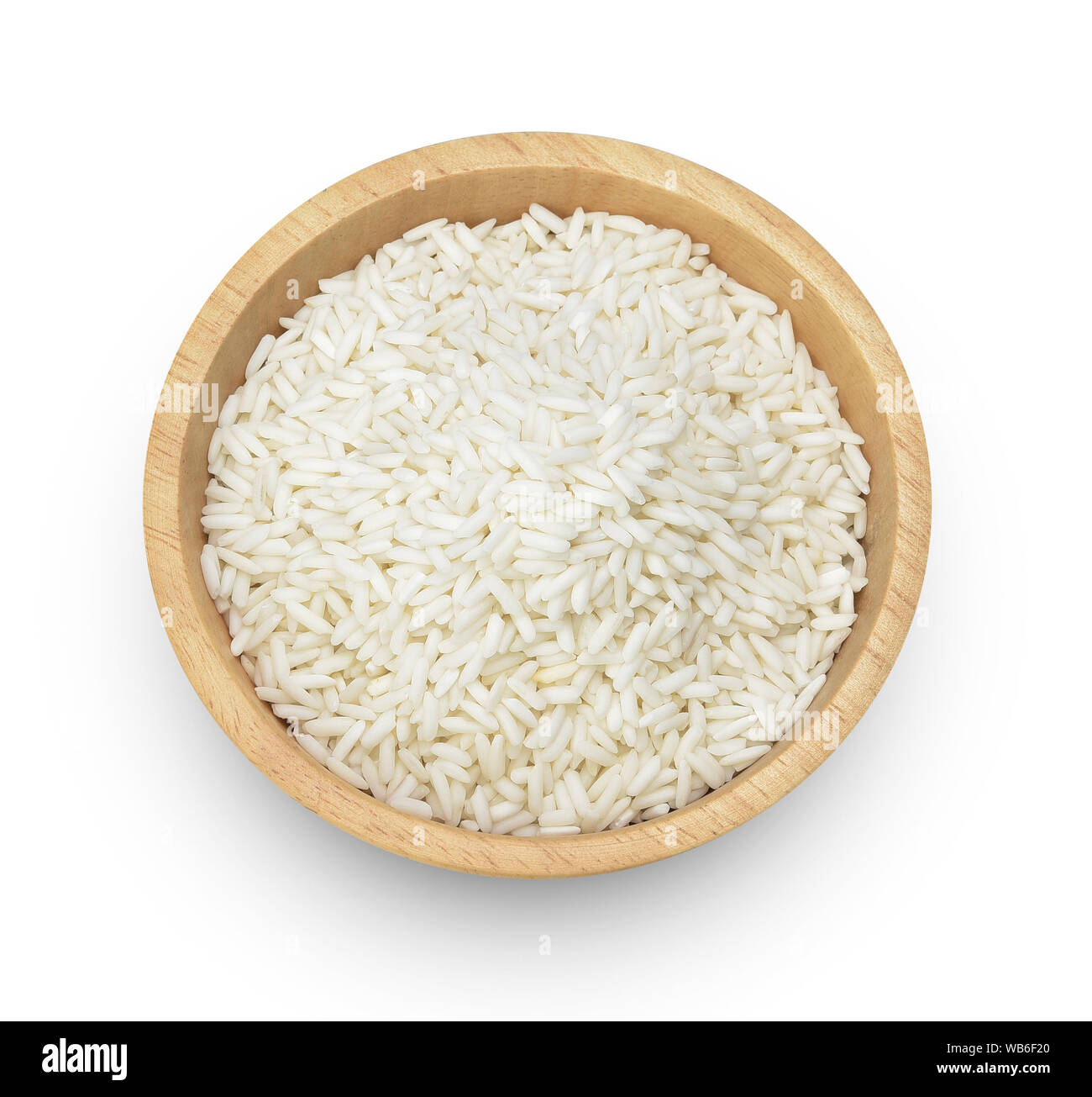 Top view of rice in wooden bowl isolated on white background Stock ...