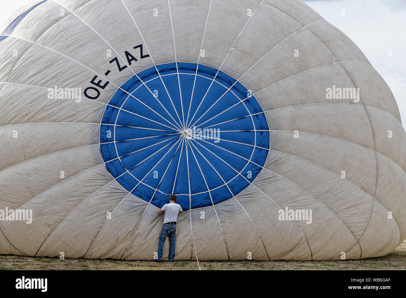 Chambley, France. 3rd August, 2019. Inflating a hot air balloon before ...