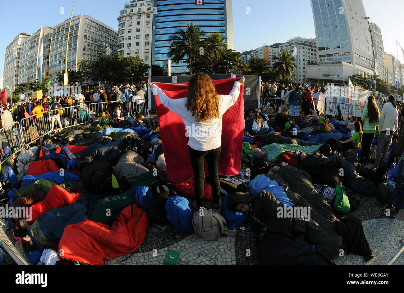 Rio de Janeiro, July 28, 2013. Catholic faithful dawn on Copacabana ...