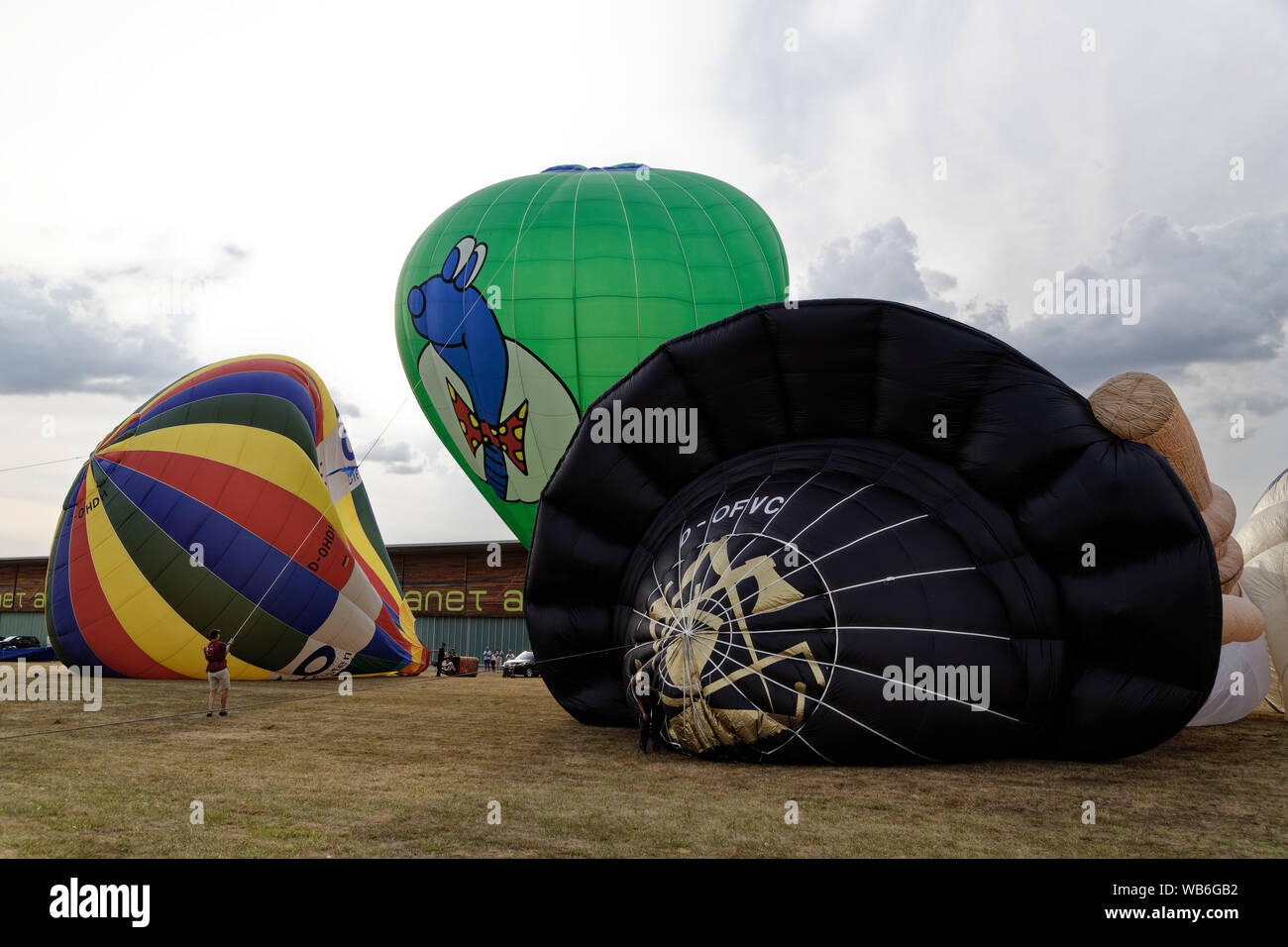 Chambley, France. 3rd August, 2019. Inflating a hot air balloon before ...