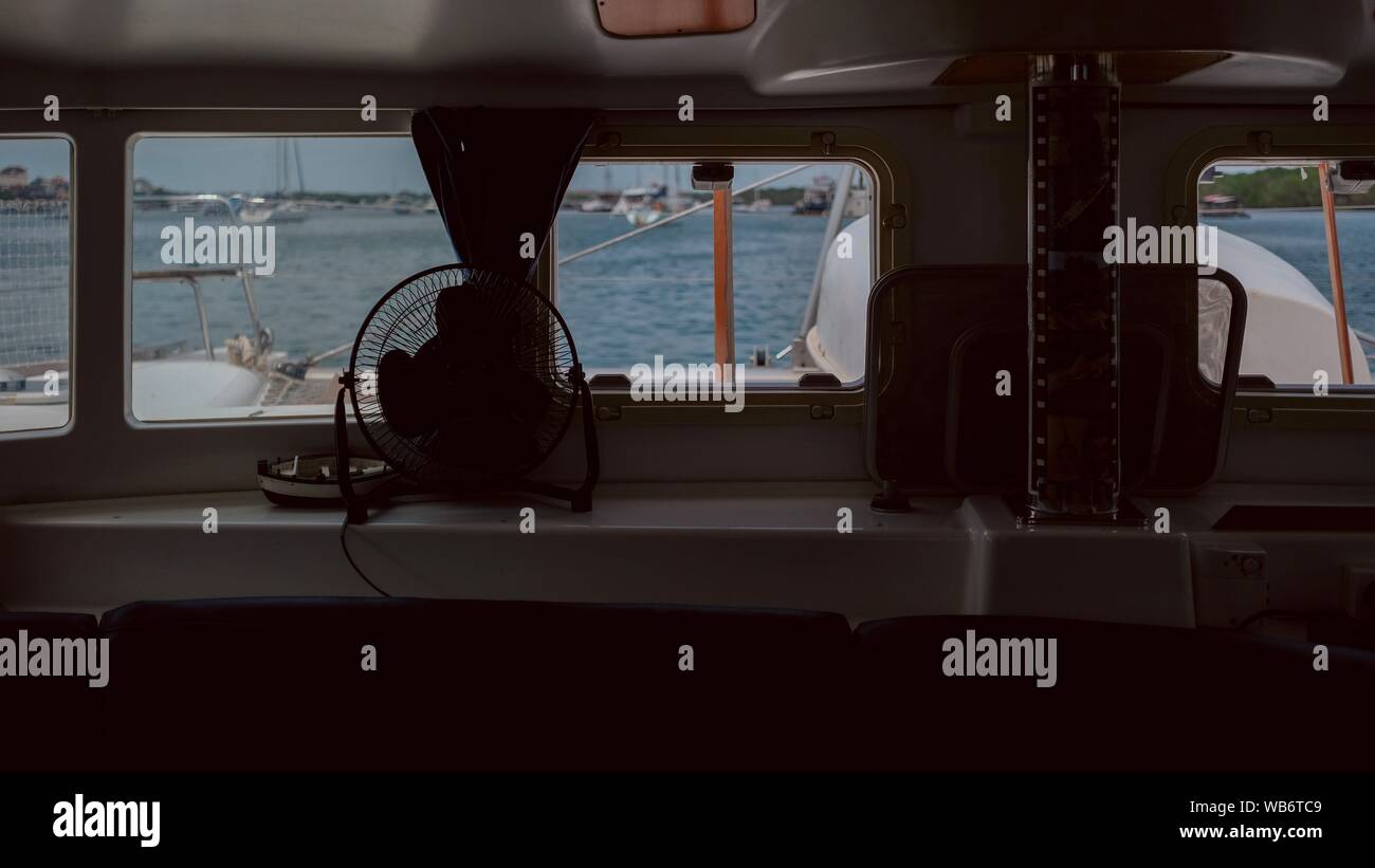 Interior shot of a large cruise ship windows in a river Stock Photo - Alamy