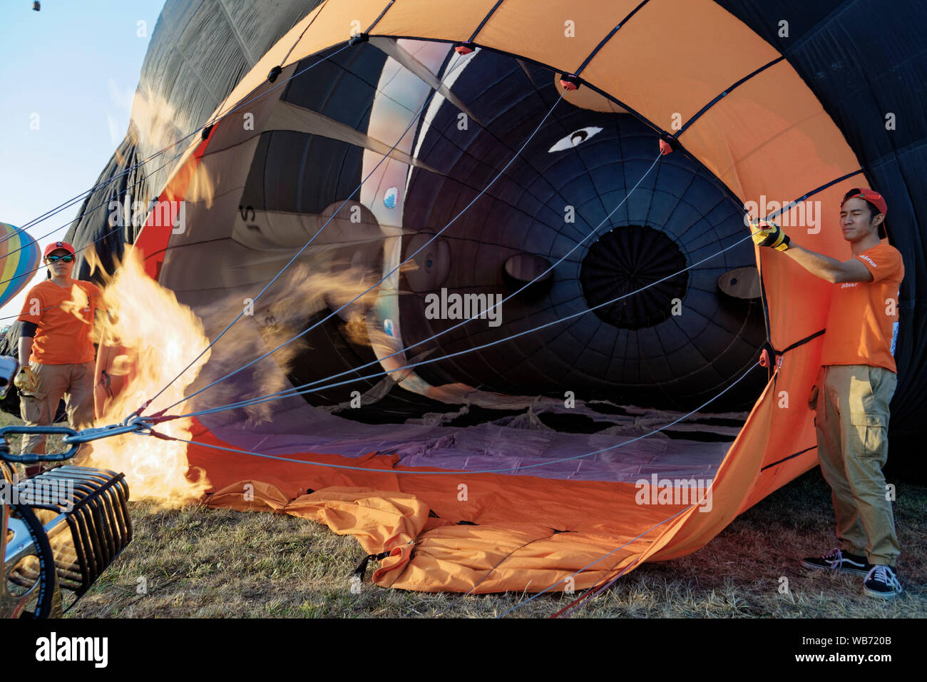Chambley, France. 4th August, 2019. Inflating a hot air balloon before ...