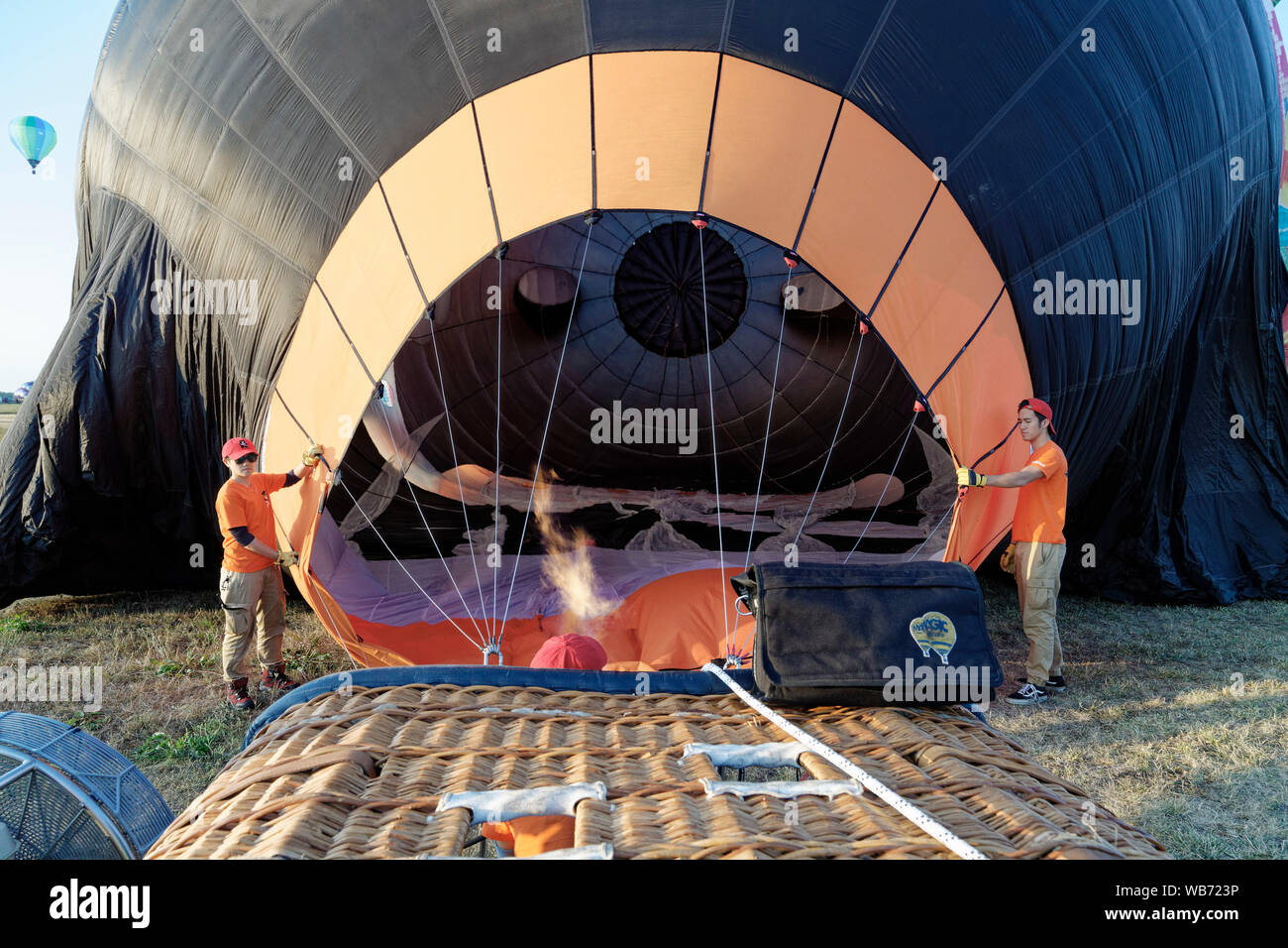 Chambley, France. 4th August, 2019. Inflating a hot air balloon before ...