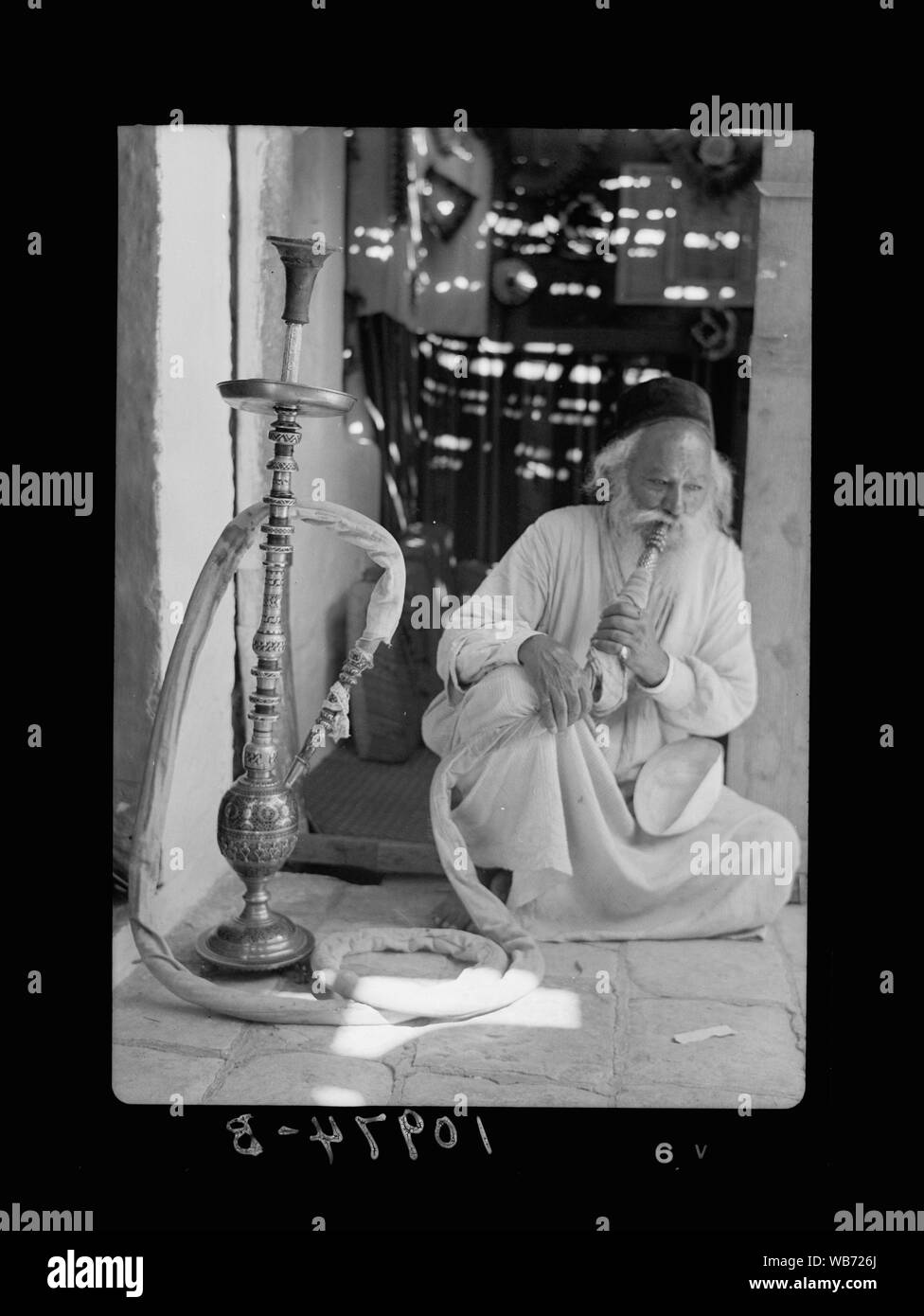 Feast of Tabernacle. Avram's booth. Avram smoking his nargeli [i.e ...
