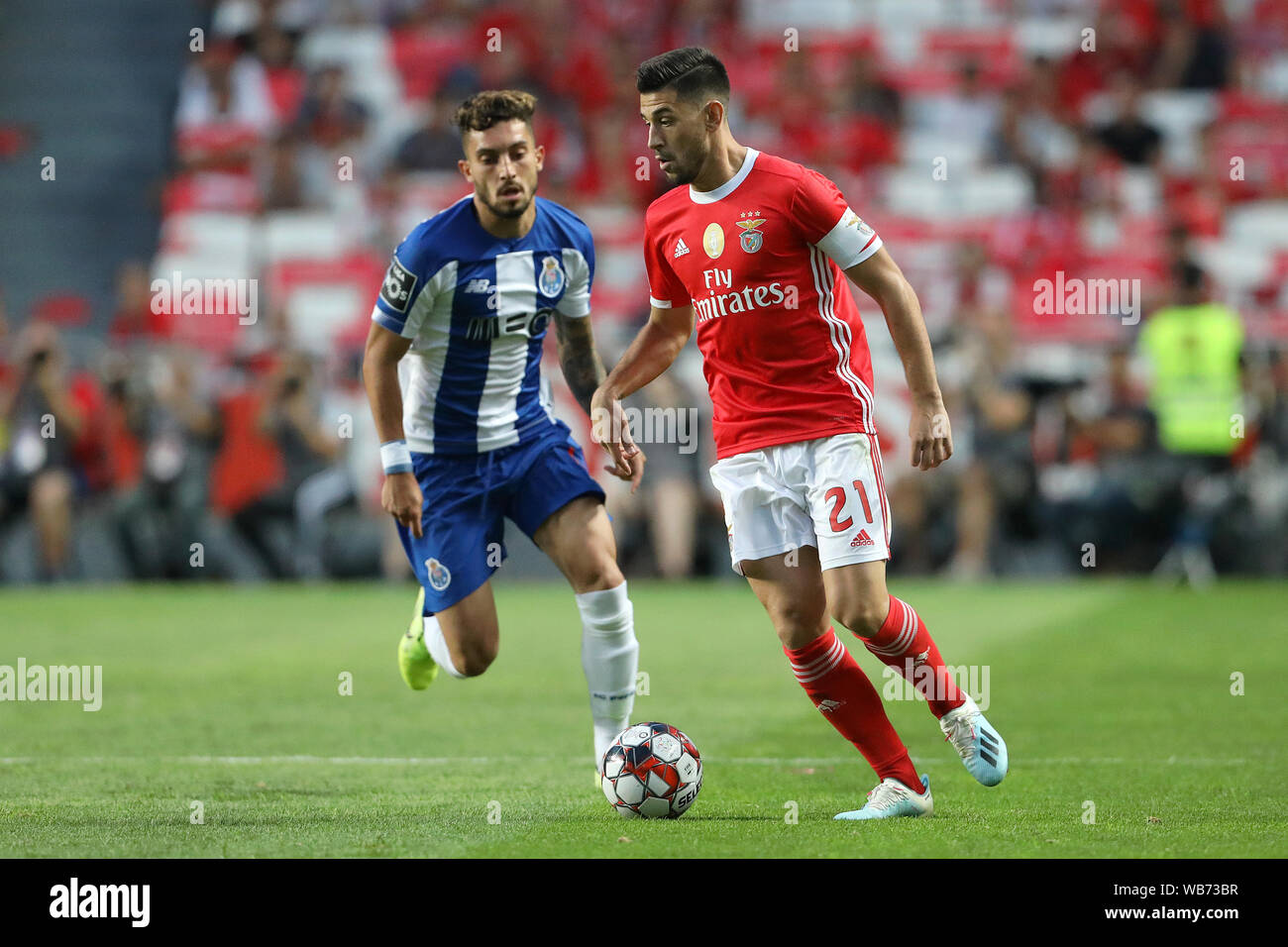 Alex Telles of FC Porto (L) and Pizzi of SL Benfica (R) are seen in ...