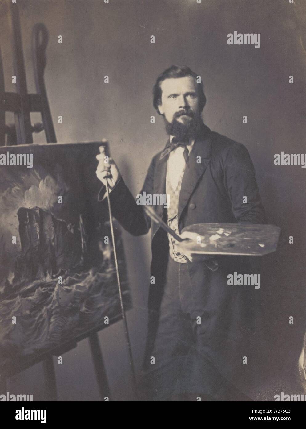 Edward Moran standing, holding a palette and paint brushes Stock Photo ...