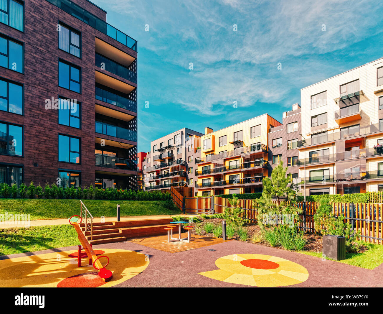 Children playground at Modern architectural complex of residential ...