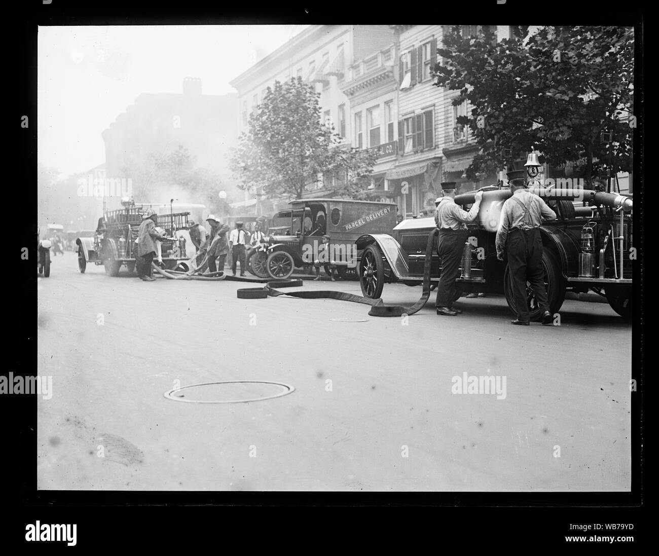 Early 1900s fire fighting hi-res stock photography and images - Alamy