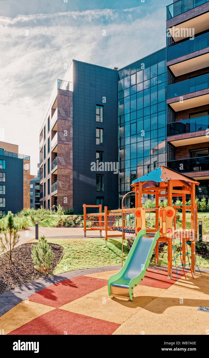Children playground at Modern complex of apartment residential ...
