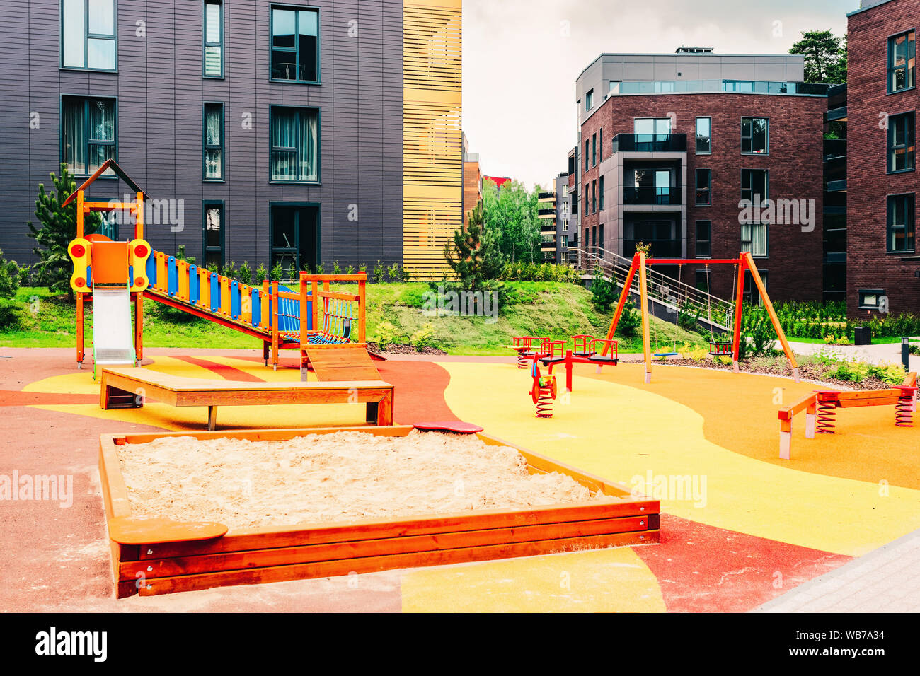 Children playground in European modern complex of apartment residential ...