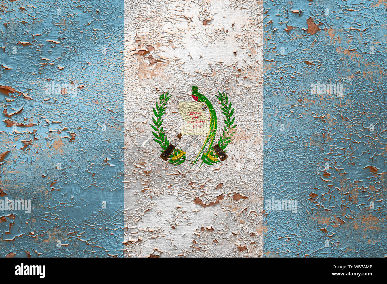 National flag of Guatemala on old peeling wall background.The concept ...