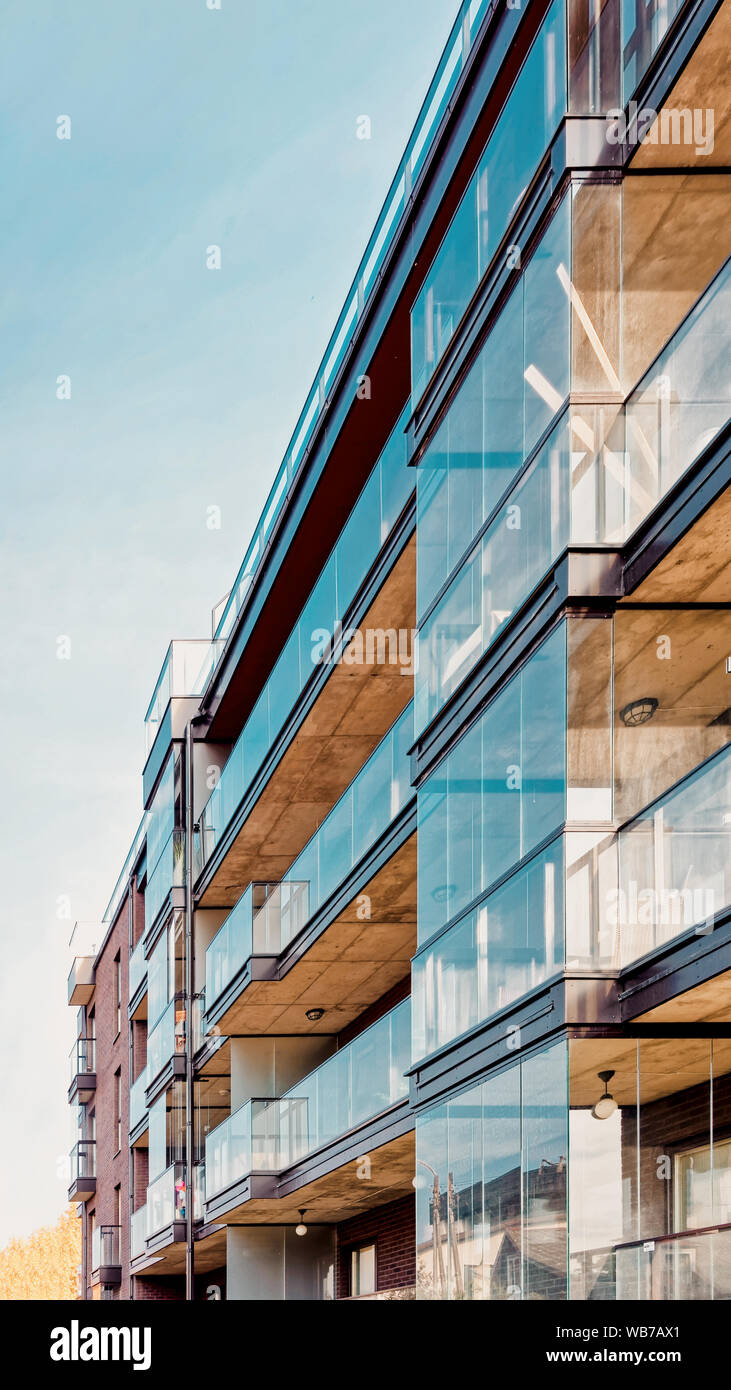 Detail of Modern glass architecture of residential building. And ...