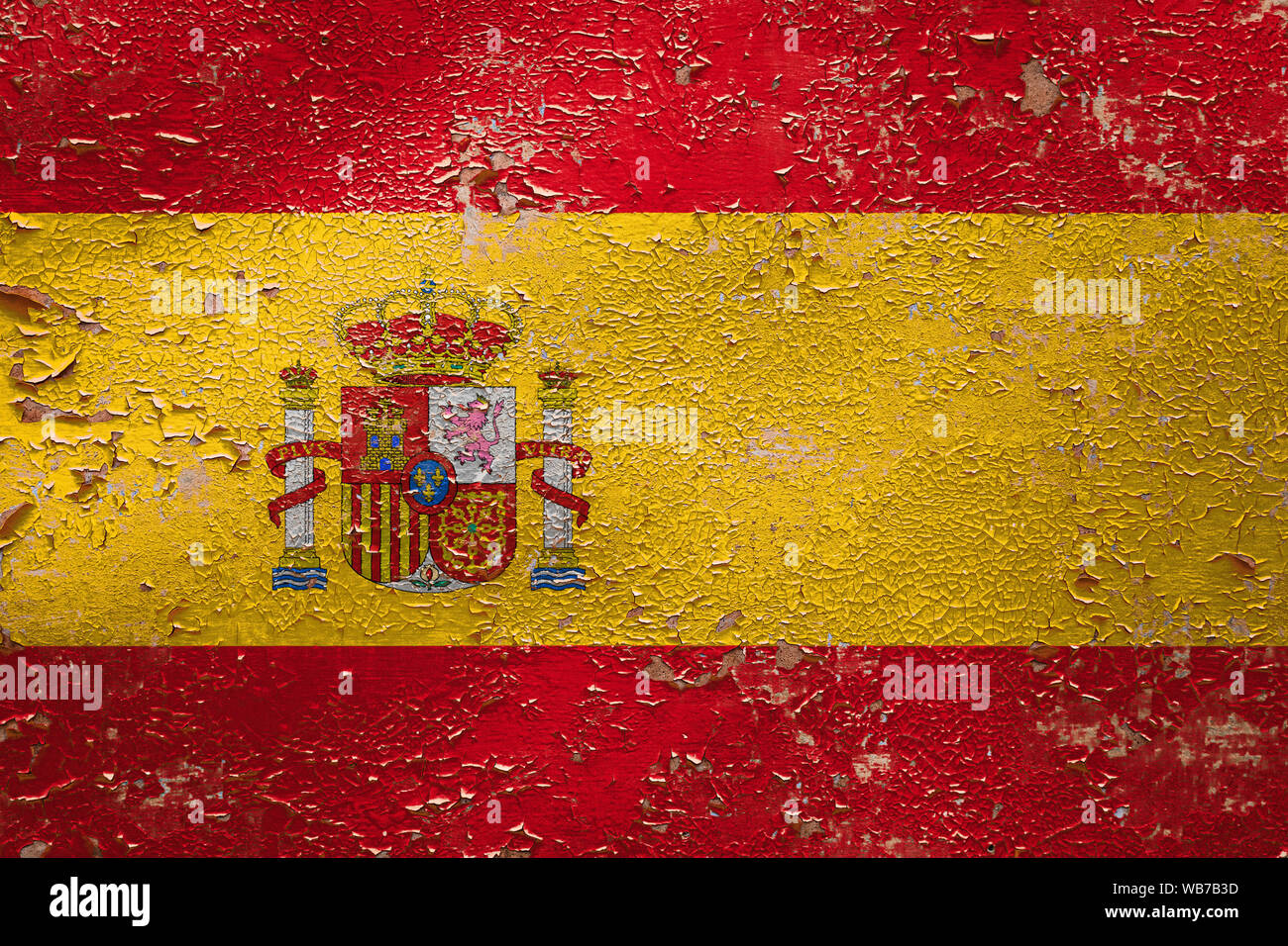 National flag of Spain on old peeling wall background.The concept of ...