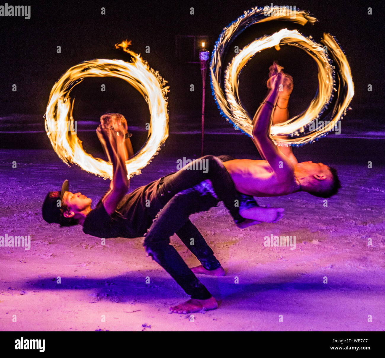 Fire show on the beach in Koh Samui in Thailand Stock Photo - Alamy