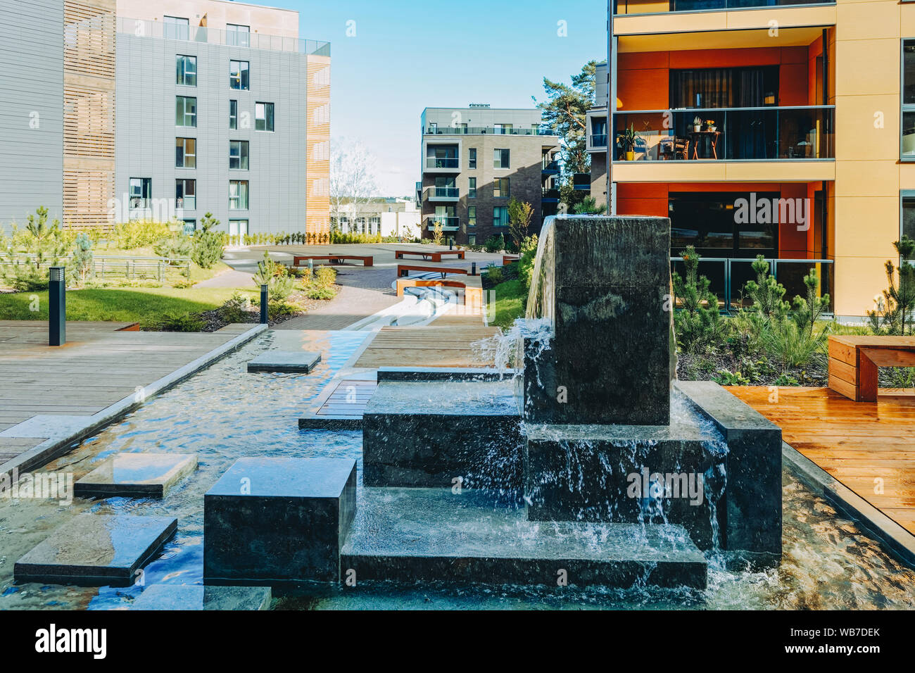 Fountain at complex of residential apartment buildings. And outdoor ...