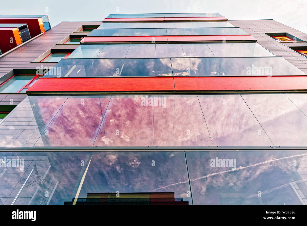 Fragment of Modern glass residential building. And outdoor facilities ...