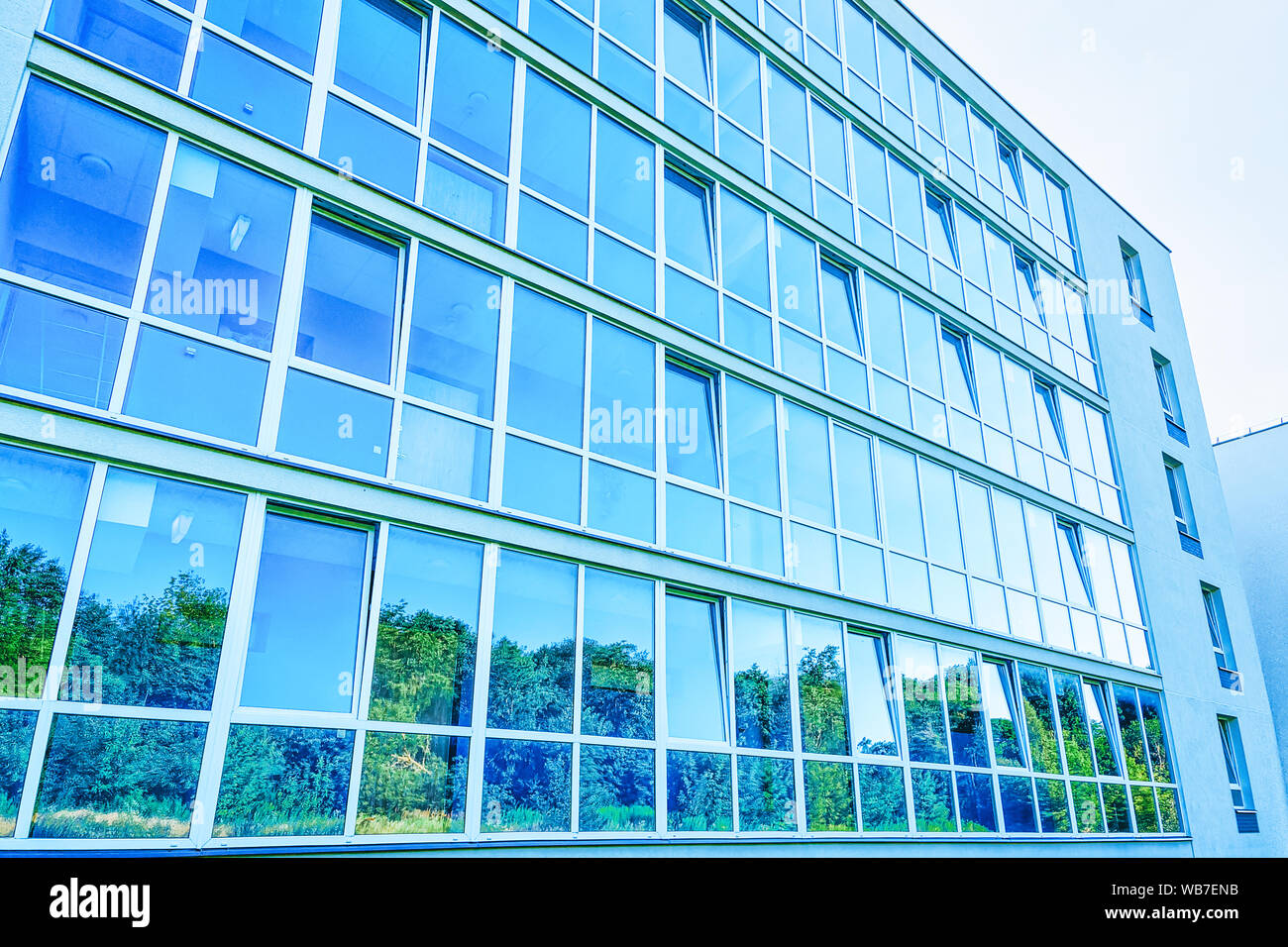 Glass windows of complex of apartment residential building Stock Photo ...