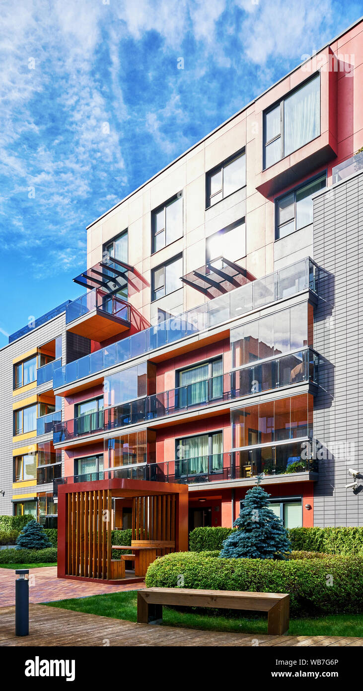 Modern complex of apartment residential buildings. Benches and outdoor ...