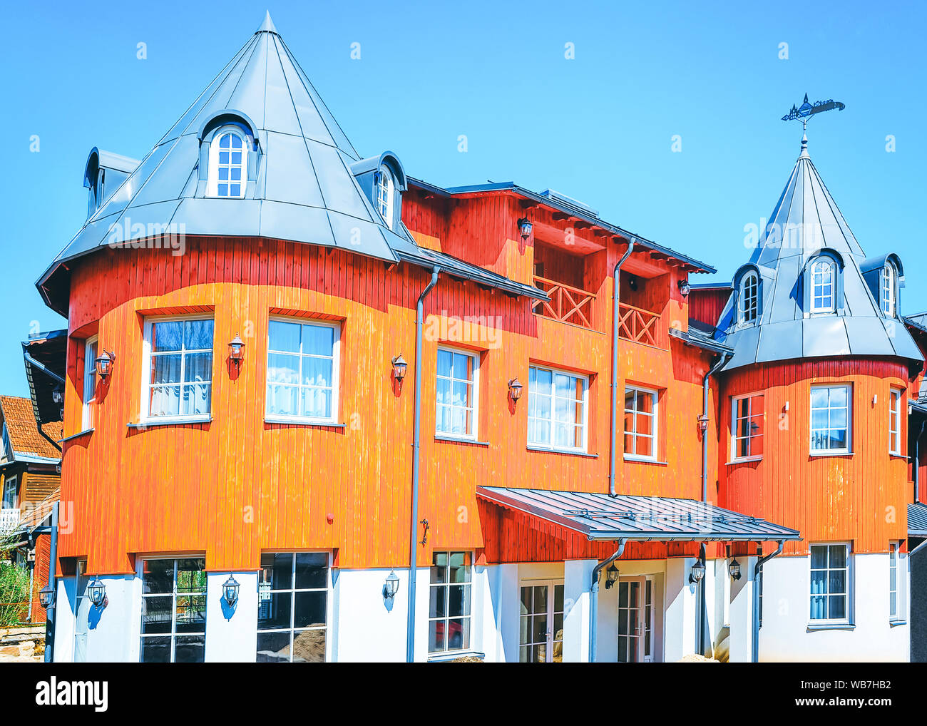 Modern red wooden red country house with towers in Druskininkai ...