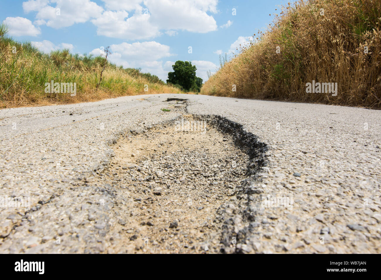 Big pothole on a national road in Sicily caused by landslide ...