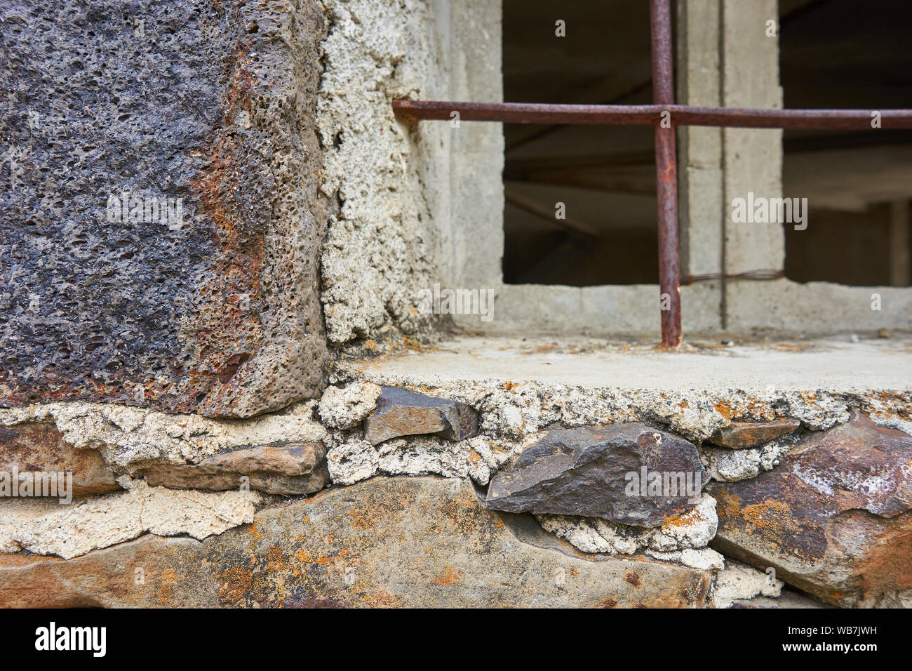 The stone structure and window detail of the pig pen animal housing at ...