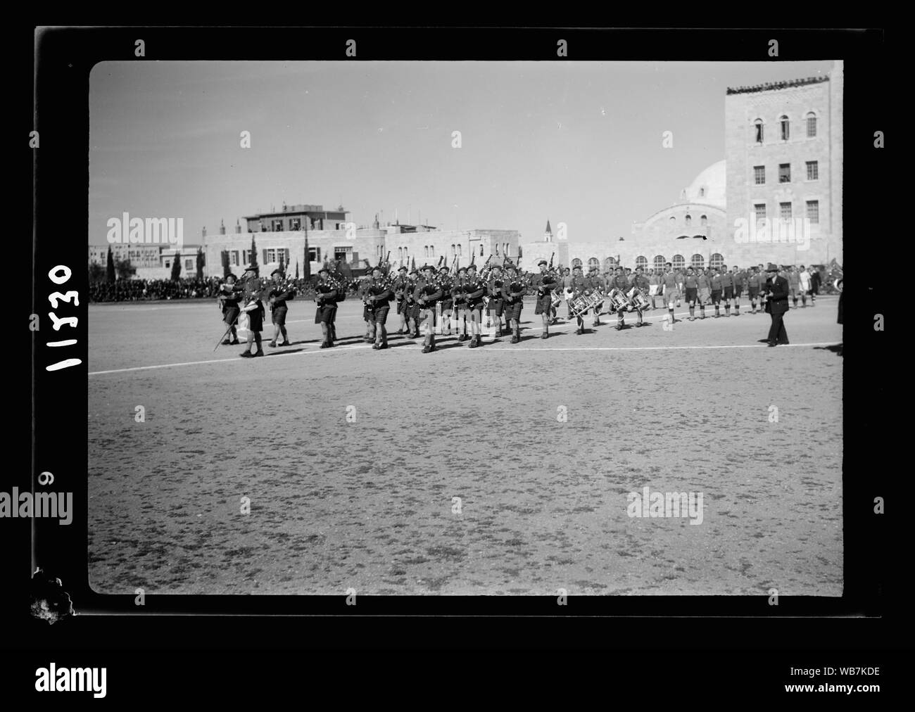 Foot ball match British Army v. French Army. Scottish pipers piping the ...