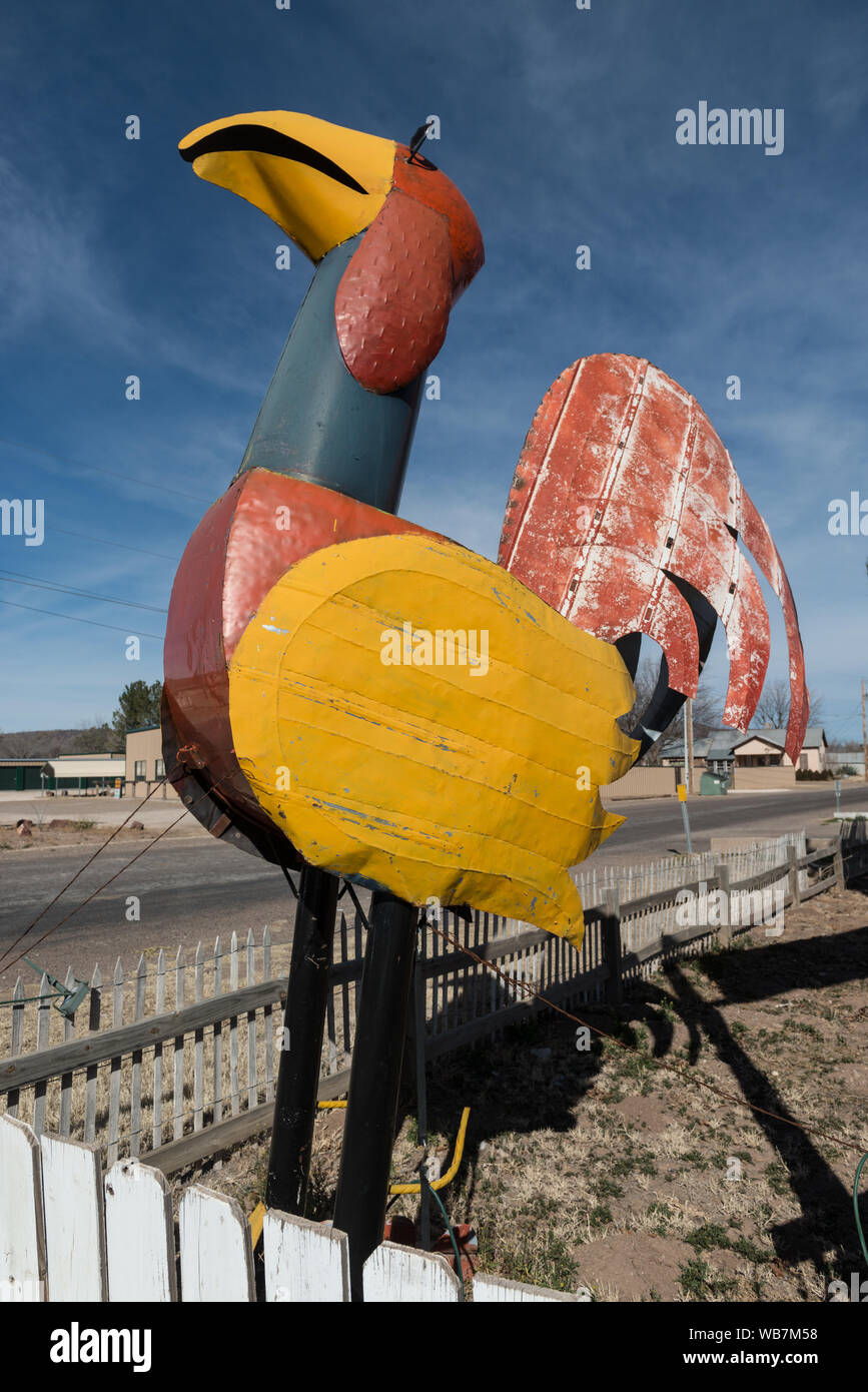 For some reason, large metal chickens are popular yard art throughout ...