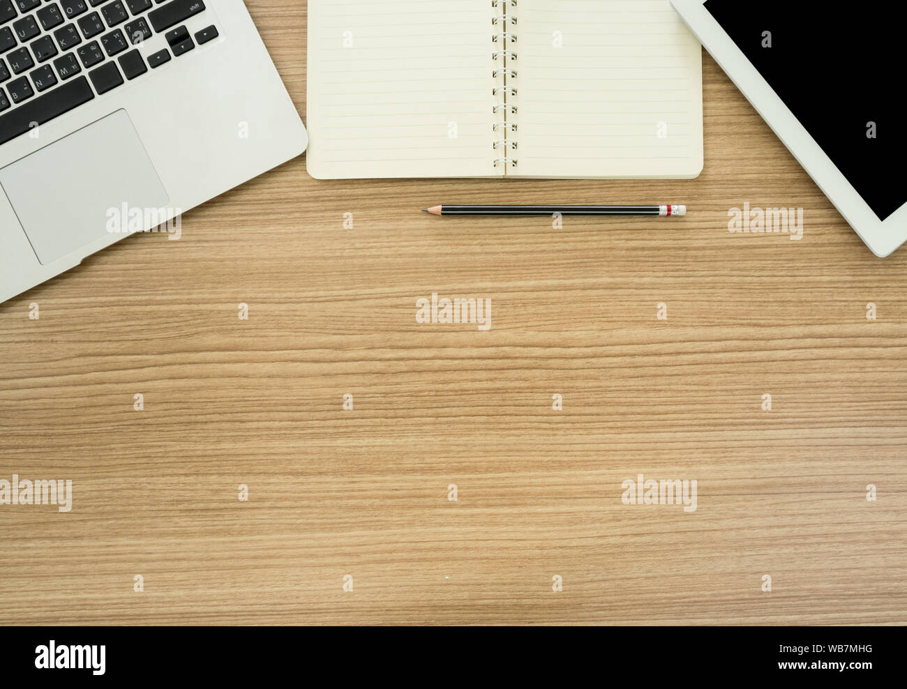 workspace with computer tablet and notebook. View from above Stock ...