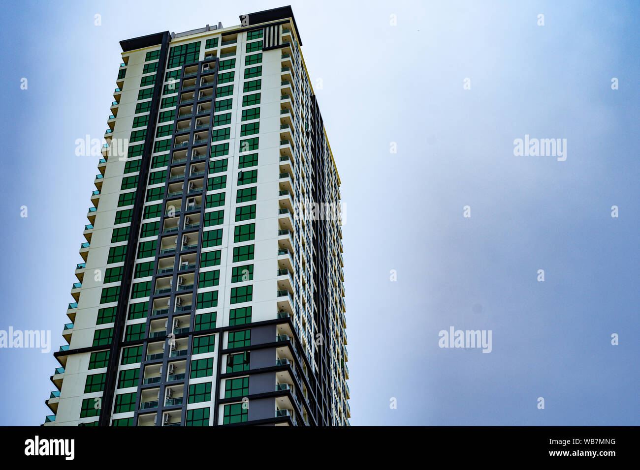 Corporate high-rise building seen in the blue sky and clouds Stock ...