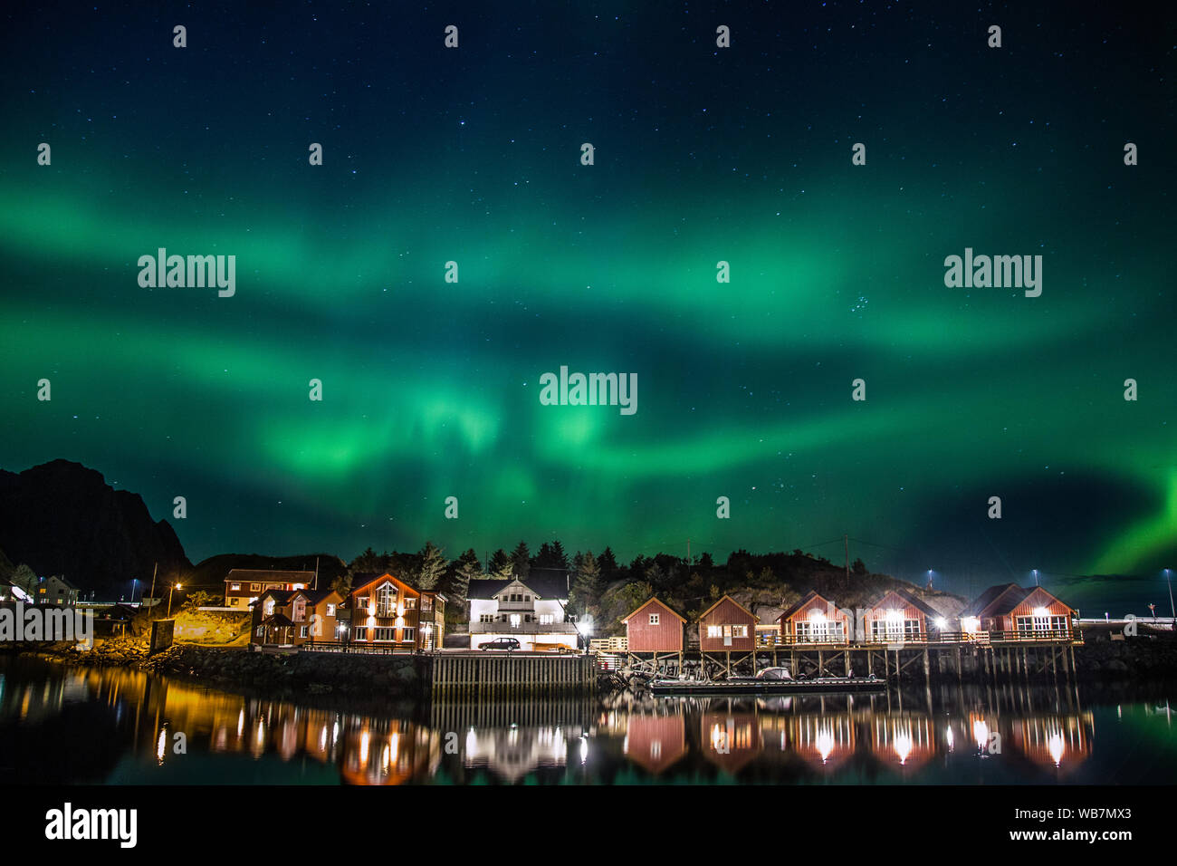 Northern lights above Reine in Lofoten islands in Norway Stock Photo ...
