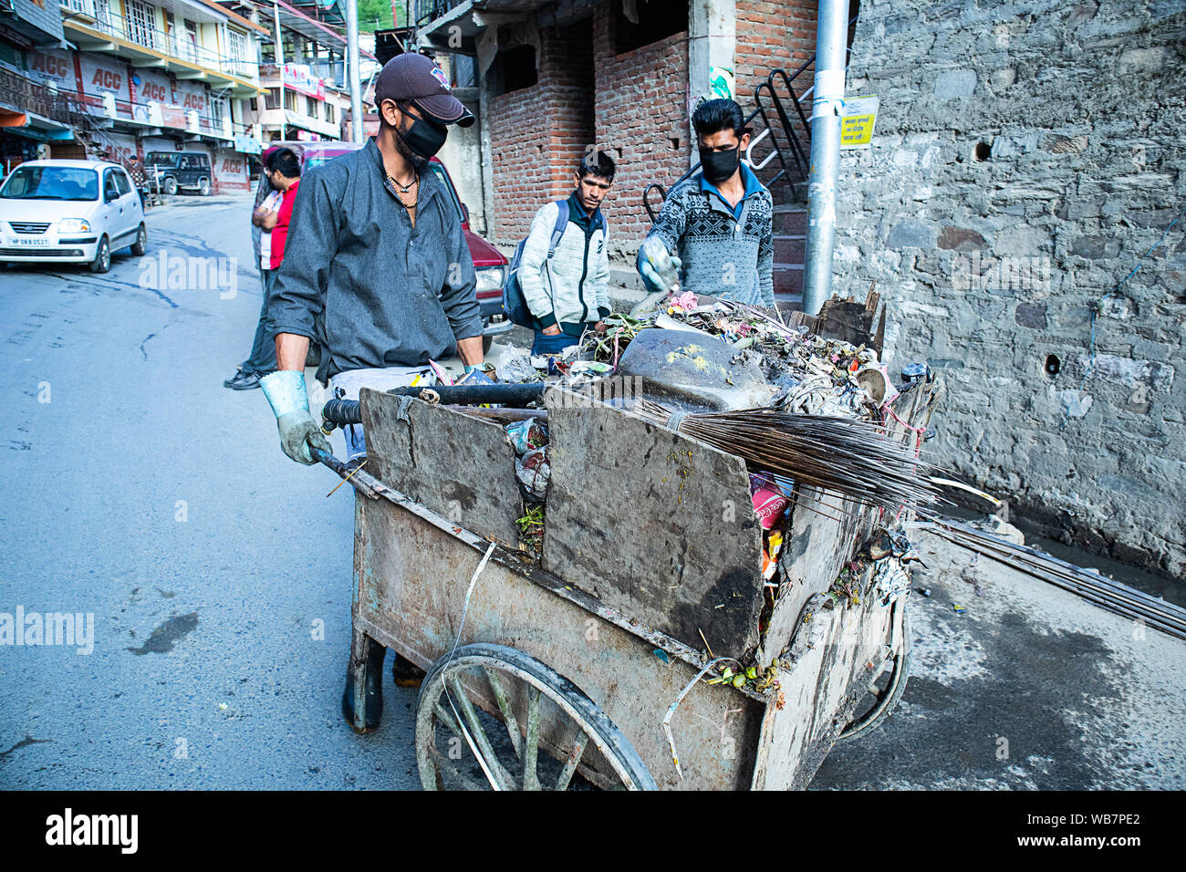 Garbage cart hi-res stock photography and images - Alamy