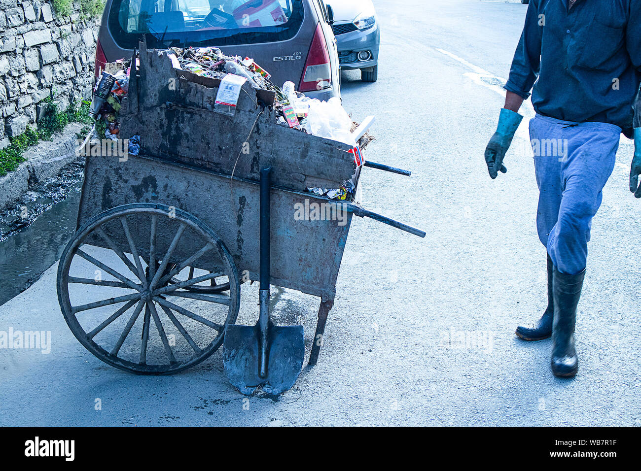 Garbage cart hi-res stock photography and images - Alamy