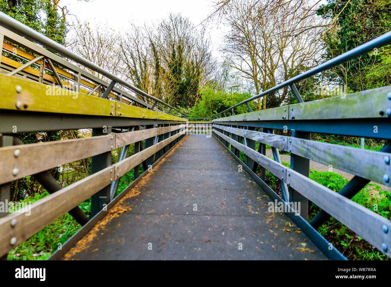 pedestrian bridge over uk motorway in evening england Stock Photo - Alamy