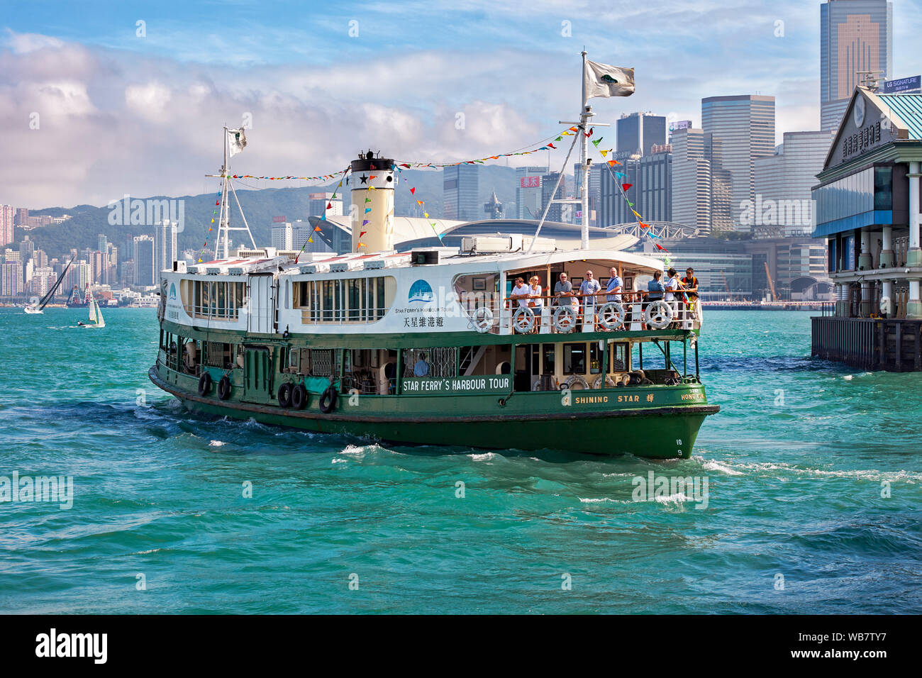 Star Ferry Harbour Tour boat with tourists on board in Victoria Harbour ...