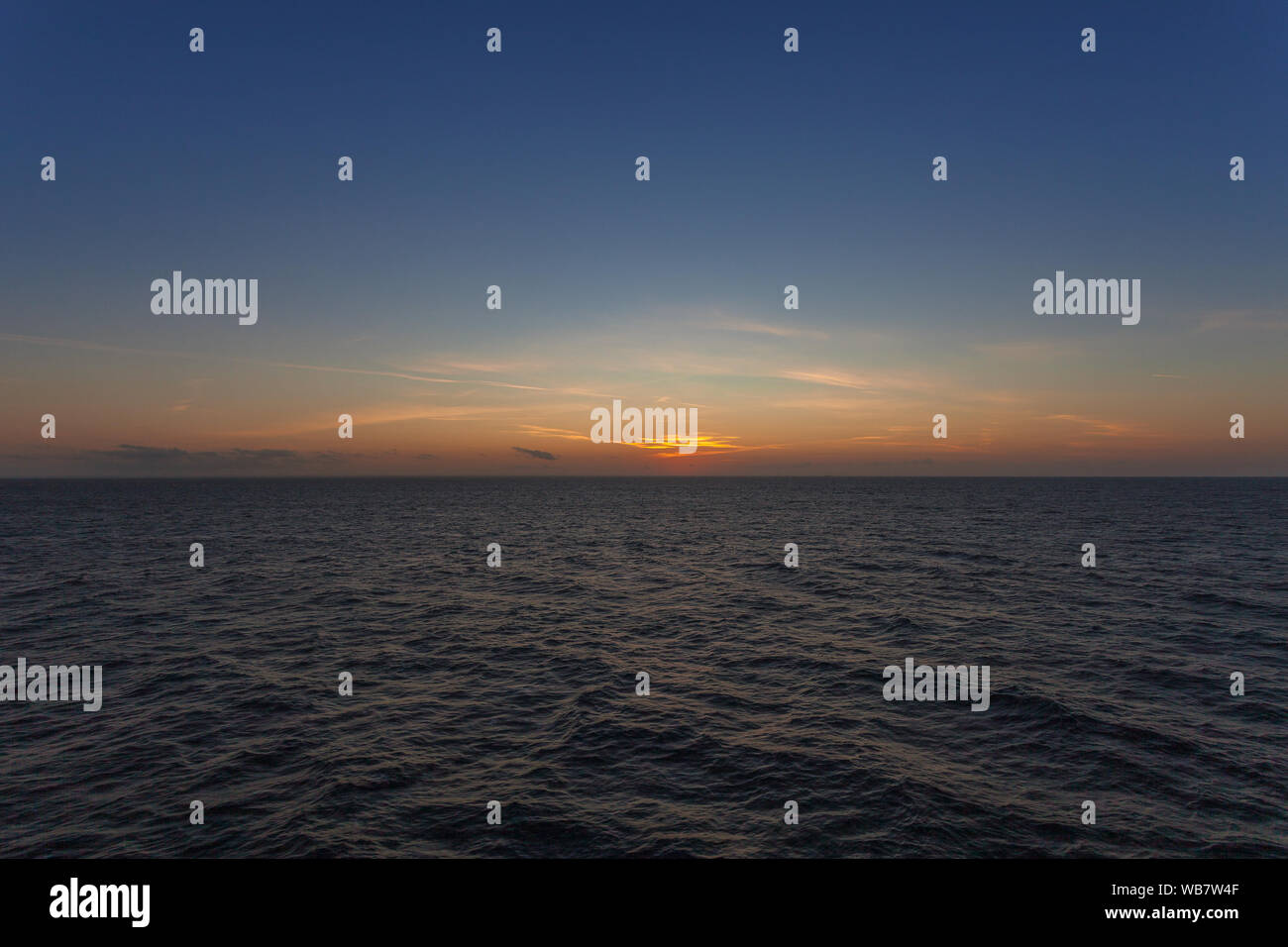 Ocean water after sunset sky hi-res stock photography and images - Alamy