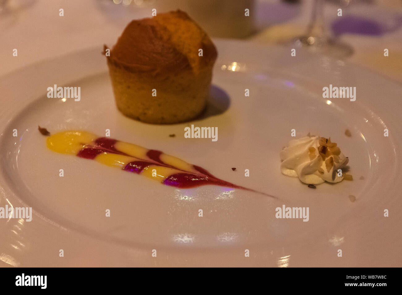 Muffin dessert over a decorated plate Stock Photo - Alamy