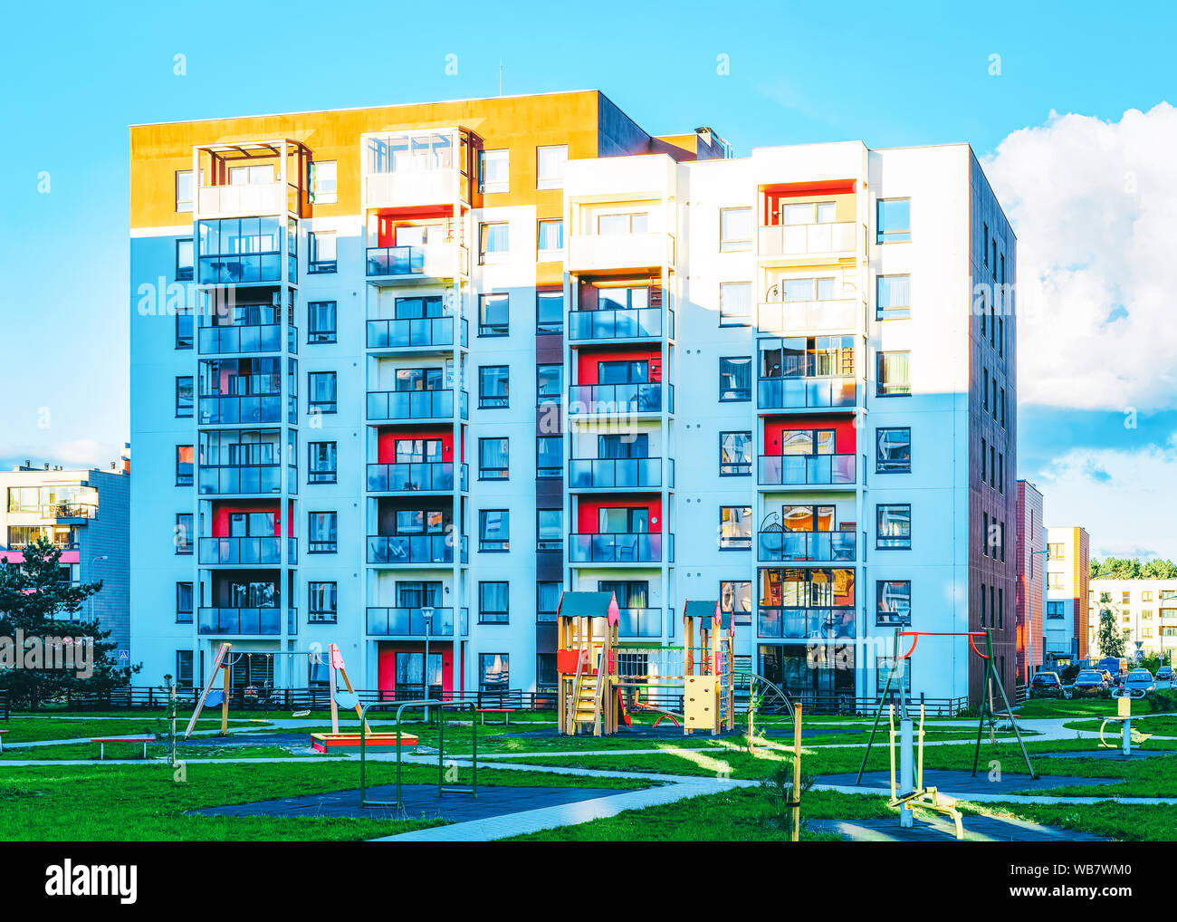 New apartment house and home buildings complex concept. Street with the ...