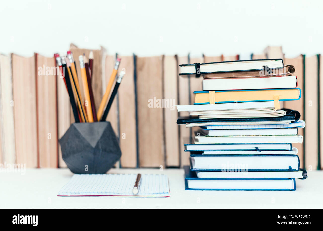 Notebooks piles, stack of books education back to school background ...