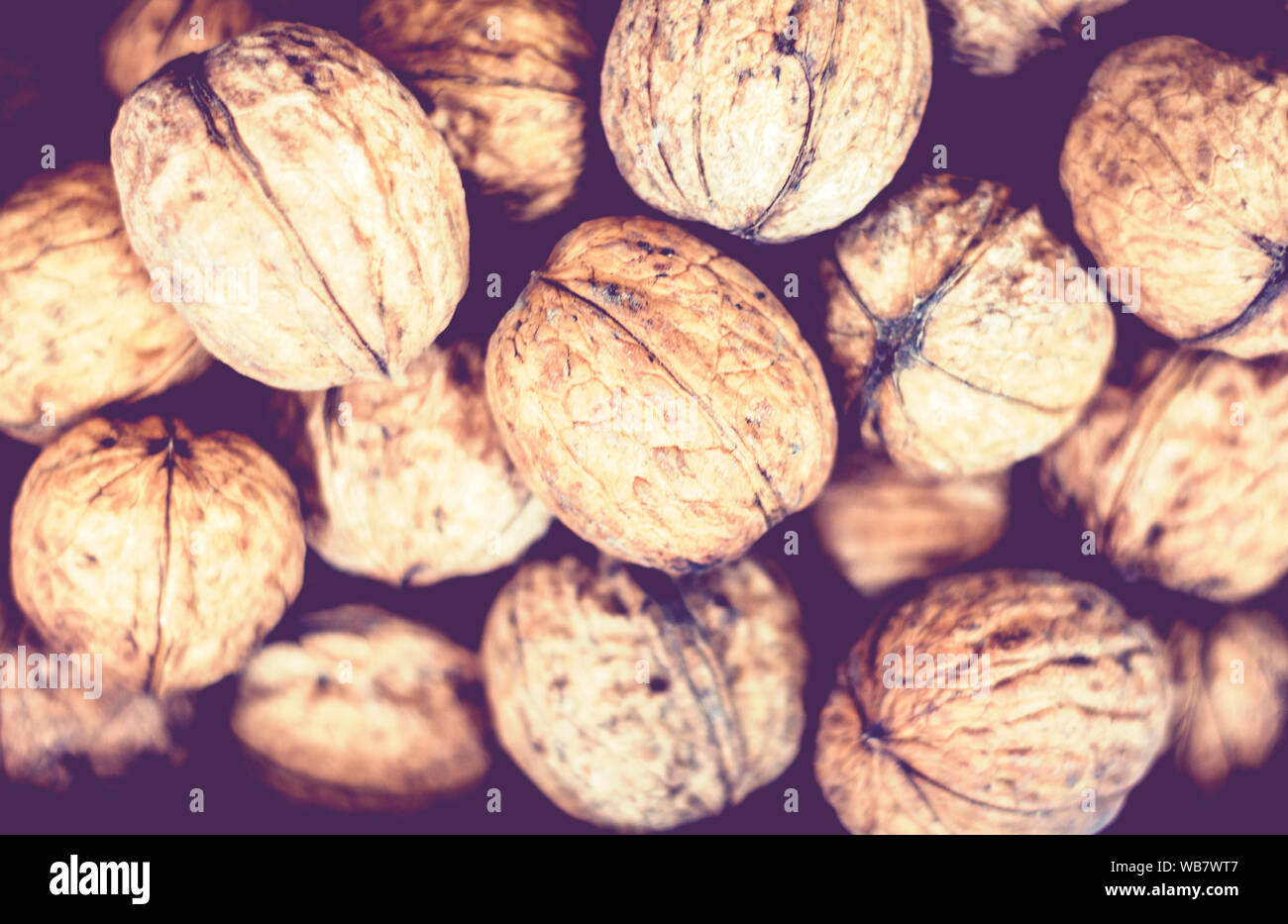 Natural walnut in shell background pattern texture Stock Photo - Alamy