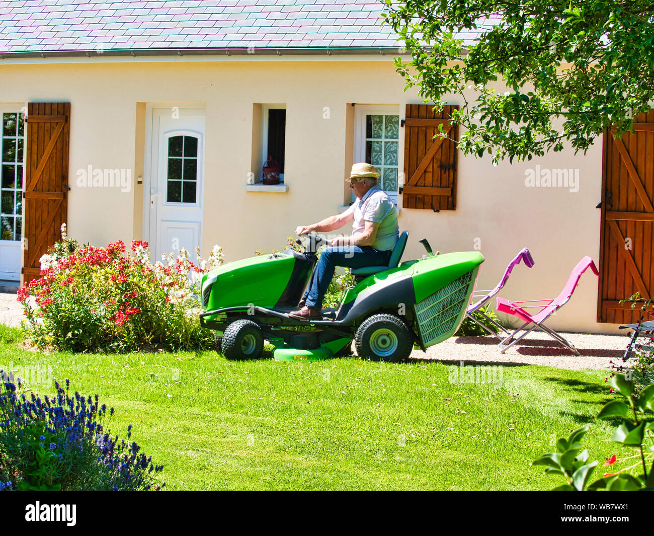 Lawnmower old flowers hi-res stock photography and images - Alamy