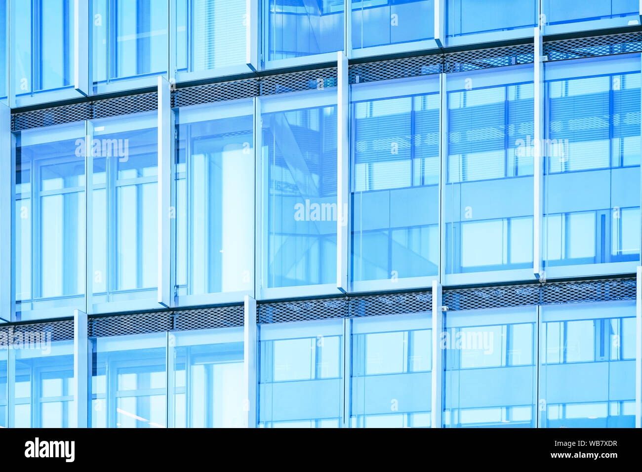 Windows of modern futuristic glass and metal skyscraper building ...