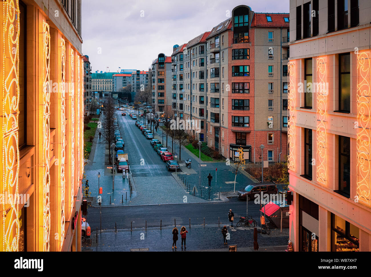 View on the evening street from Shopping center mall in German City ...