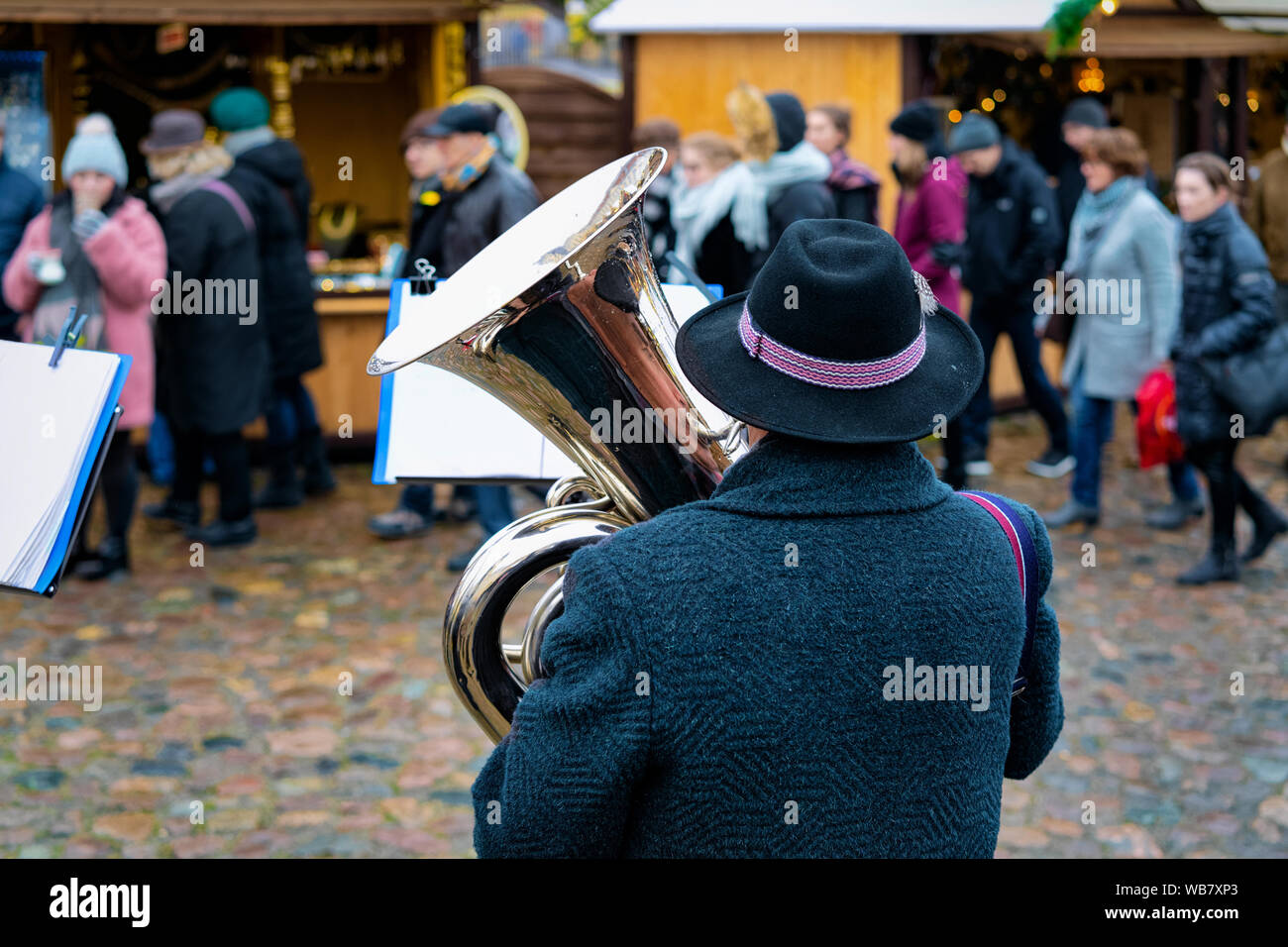 Man in Orchestra playing trumpets on Christmas market in Charlottenburg ...
