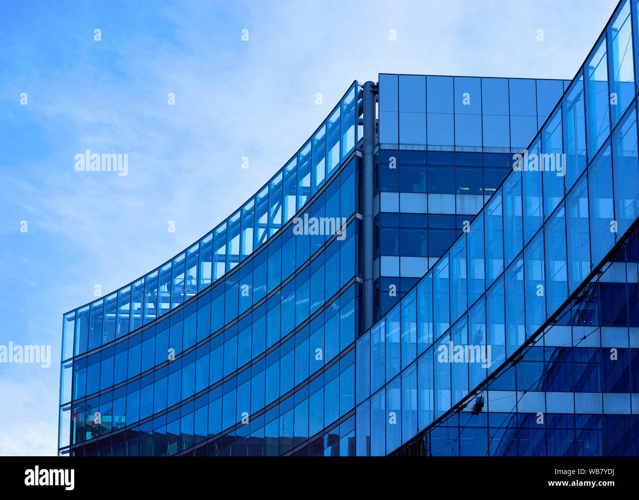Modern Blue glass European apartment house and business building ...